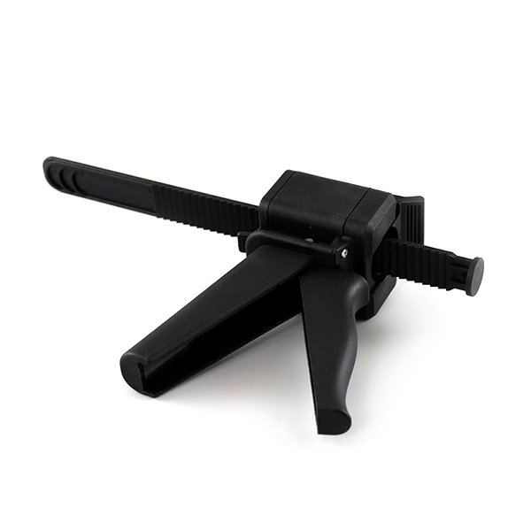 Dispensing gun for 30 cc and 55 cc syringe barrels